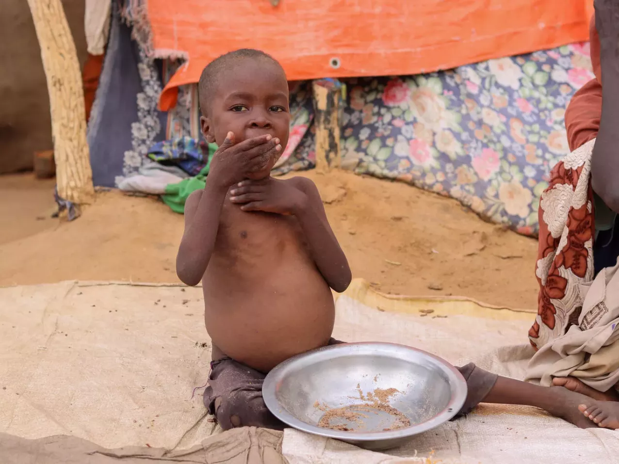Trapped by war and hunger | UNICEF Sudan